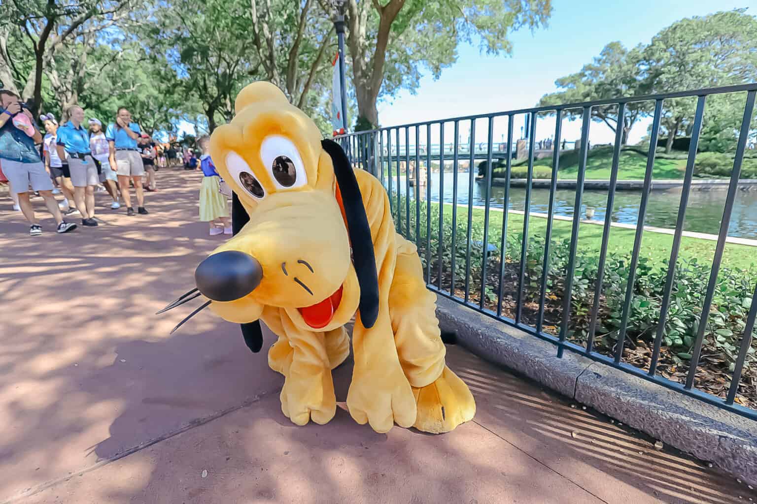 Where To Meet Pluto at Epcot (Near the International Gateway) - Resorts Gal