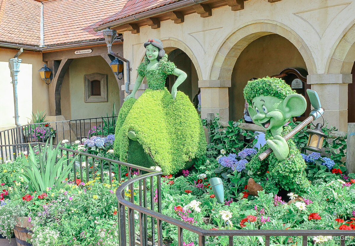 Through the Years: Snow White and the Seven Dwarfs Character Topiaries ...