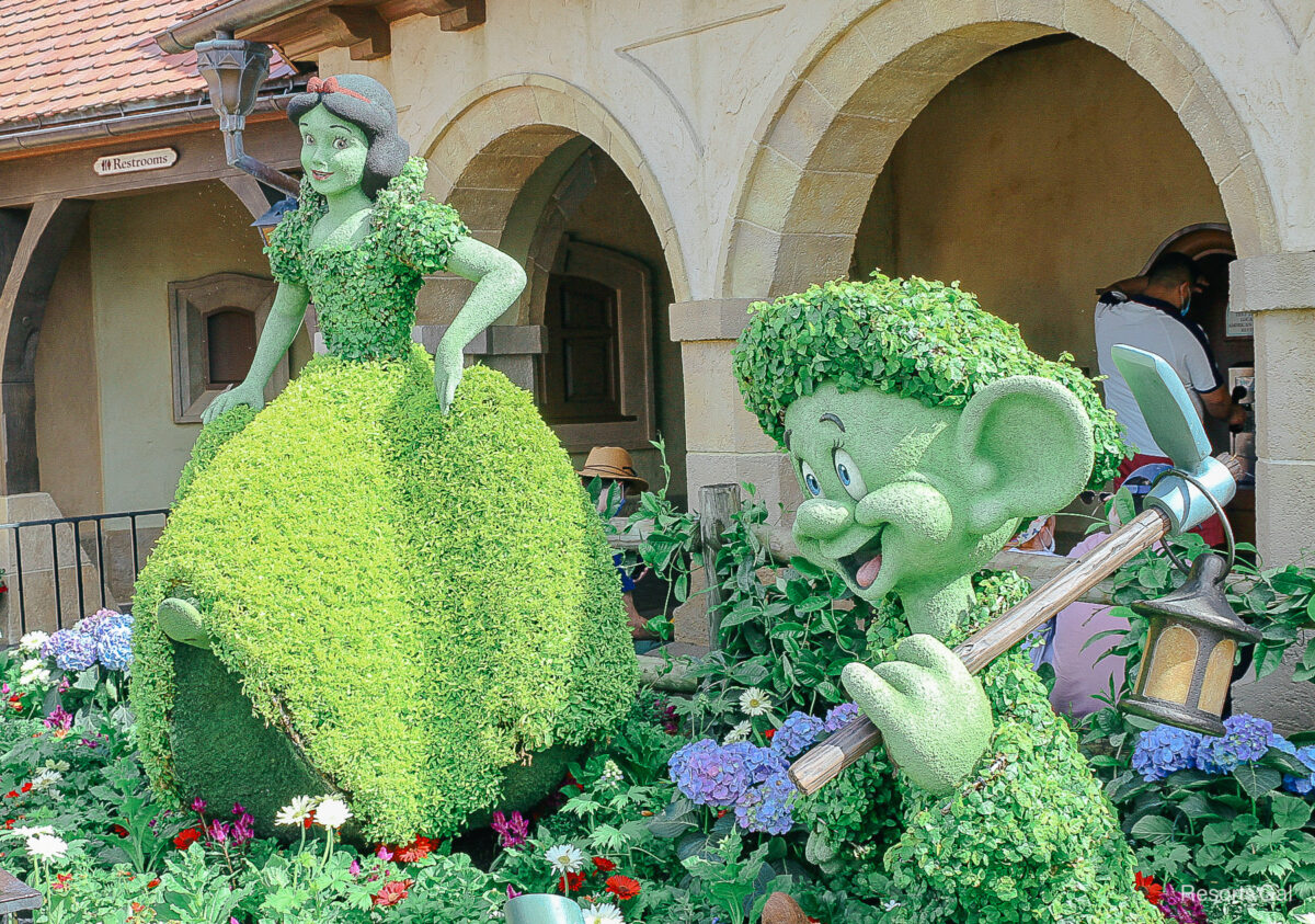 Through the Years: Snow White and the Seven Dwarfs Character Topiaries ...
